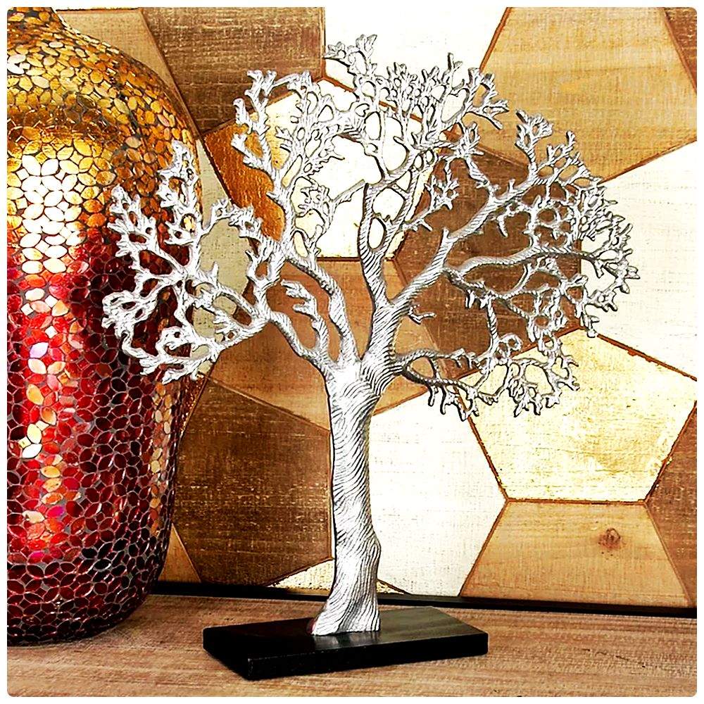 Solve Silver Tree Sculpture jigsaw puzzle online with 196 pieces
