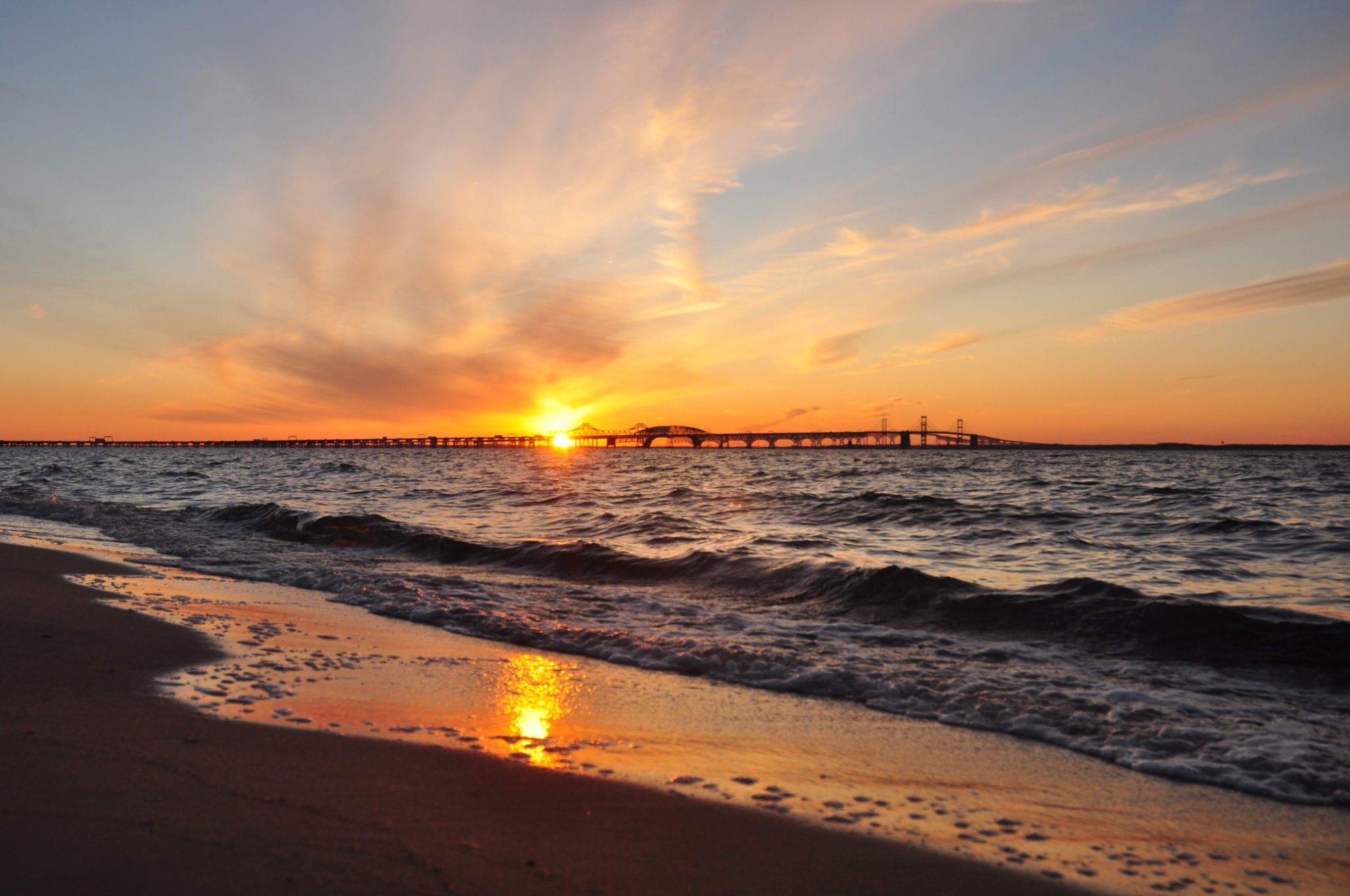 Solve Chesapeake Bay Bridge at sunset jigsaw puzzle online with 70 pieces