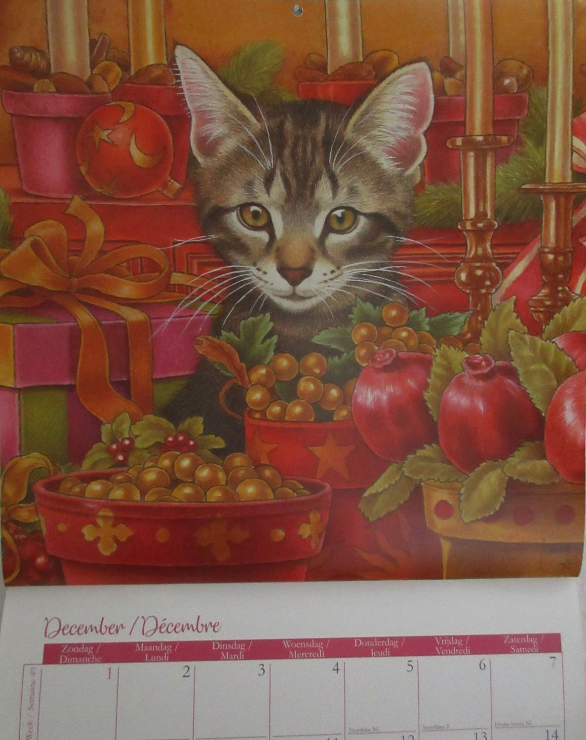 Solve Kitty Calendar December 2024 jigsaw puzzle online with 48 pieces