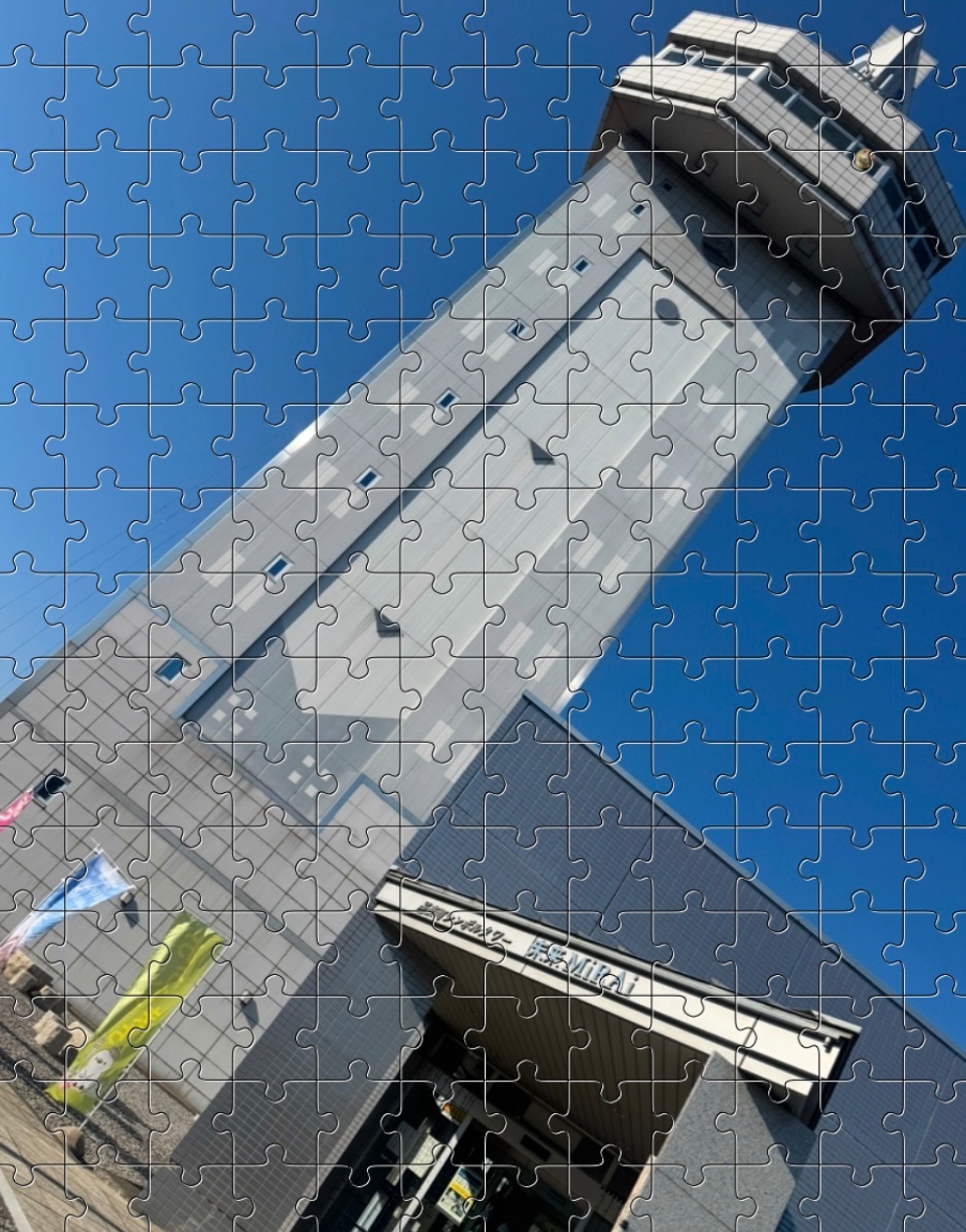 Solve Symbol Tower jigsaw puzzle online with 208 pieces
