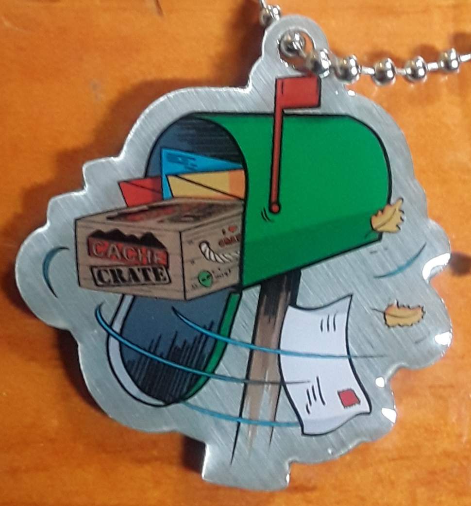 Solve Cache Crate Geocaching Trackable jigsaw puzzle online with 25 pieces