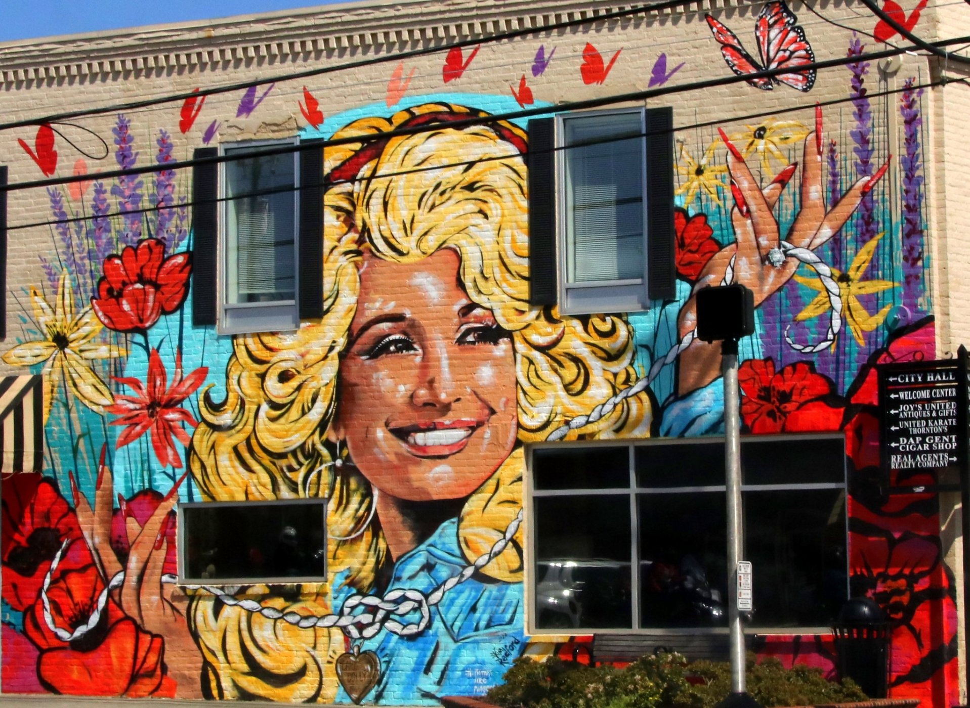 Solve Dolly Parton's Wedding Mural jigsaw puzzle online with 70 pieces