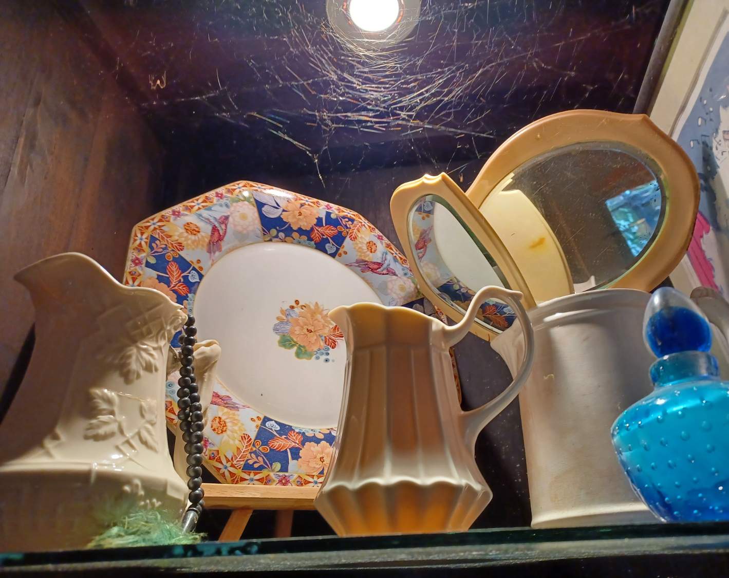 Solve Oh creepy cobwebs. . . inside this cabinet of curiosities. . .and ...