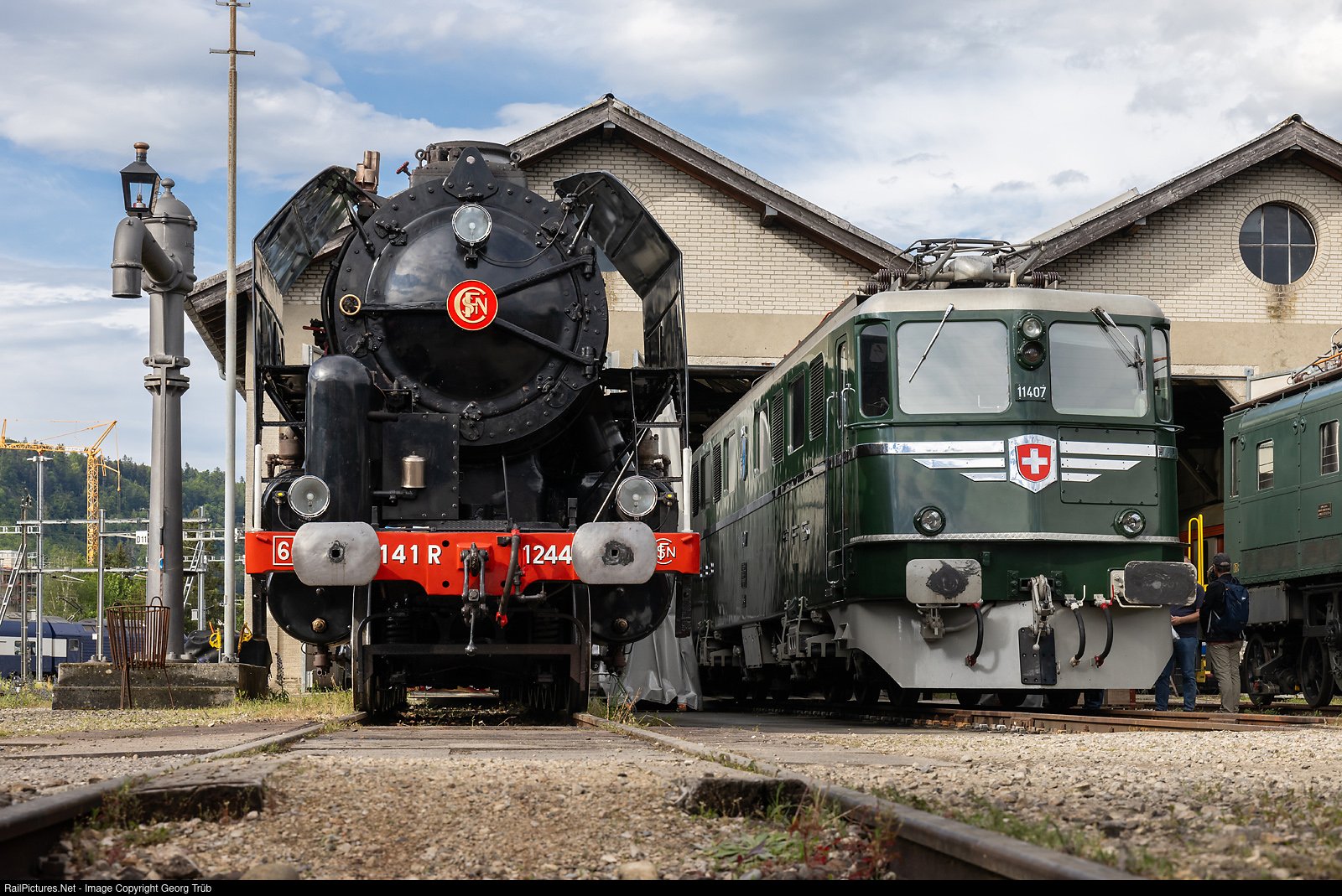 Solve A couple of classy "ladies" pose side-by-side for photographs ...