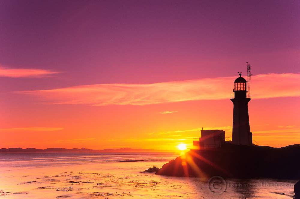 Solve Sheringham Lighthouse at sunset near Jordan River, BC jigsaw ...