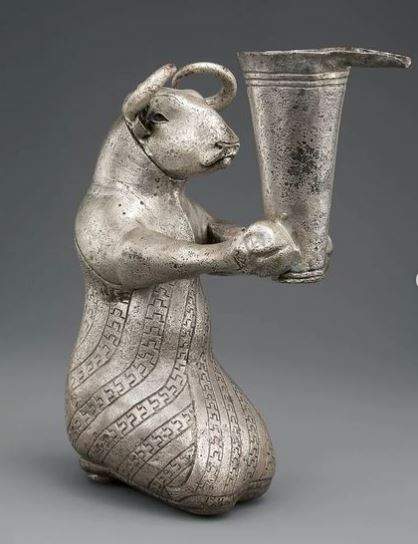 Solve Proto-Elamite Vessel with spout - in the form of a ram with human ...