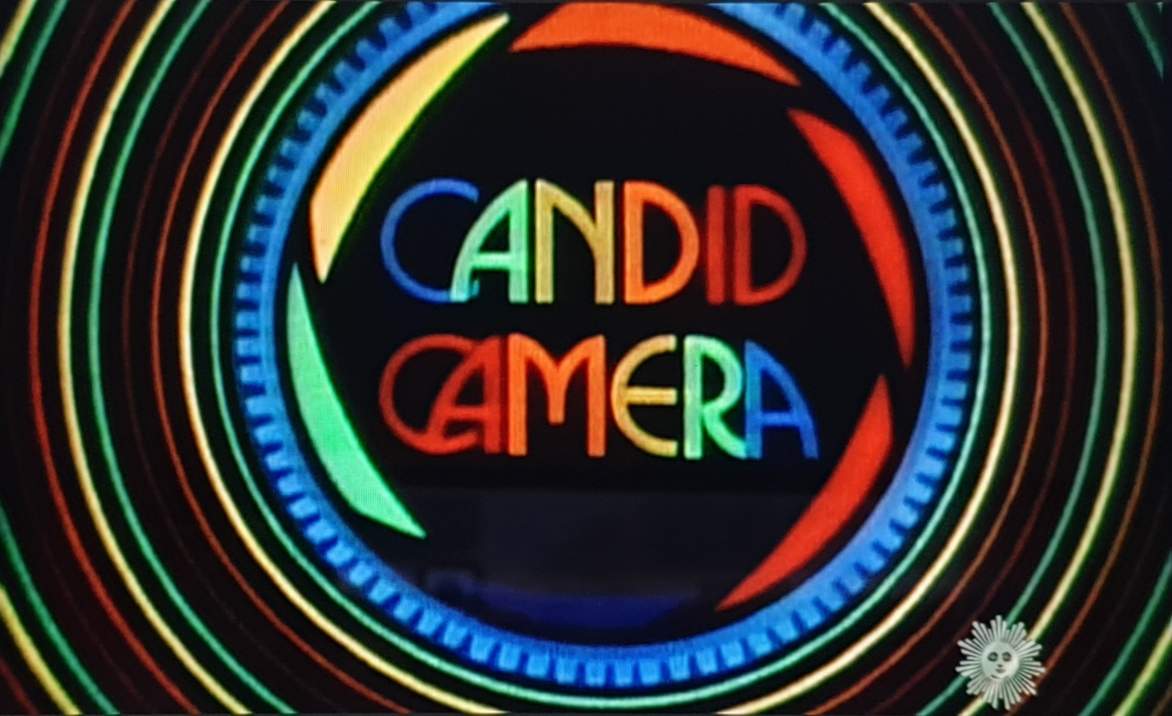 Solve CANDID CAMERA - SITTING TOO CLOSE jigsaw puzzle online with 15 pieces