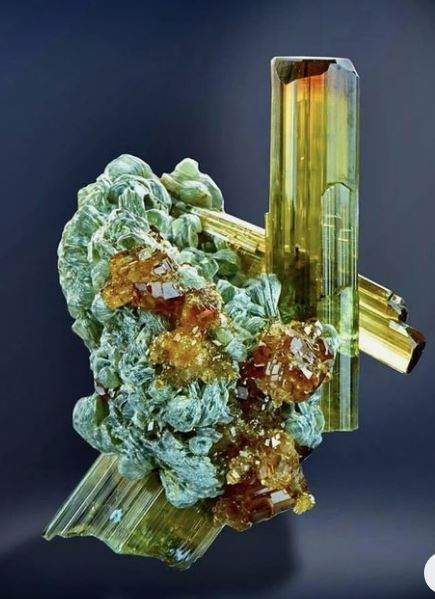 Solve Vesuvianite (green-yellow-brown) with Hessonite Garnets (orange ...