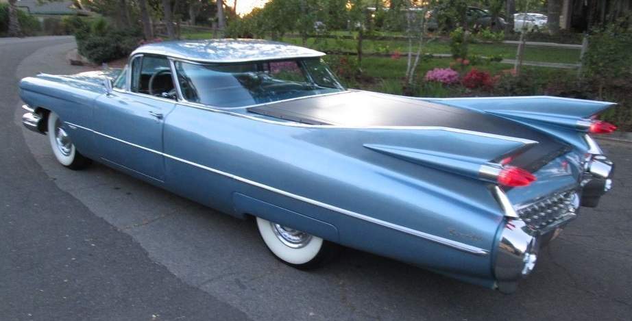 Solve 1959 Cadillac Flower Car blue jigsaw puzzle online with 91 pieces