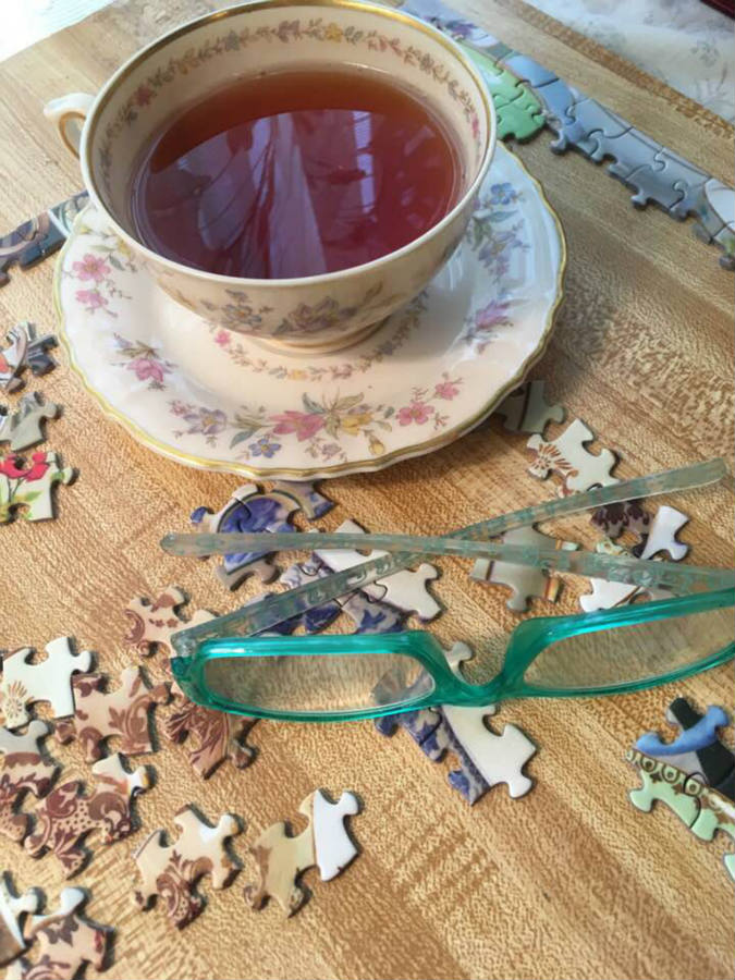 Solve Tea and a Jigsaw Puzzle jigsaw puzzle online with 48 pieces