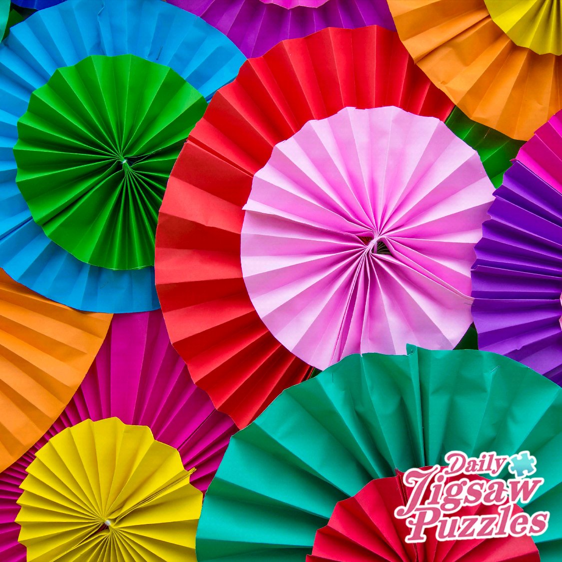 Solve Paper fans . . . . . jigsaw puzzle online with 9 pieces