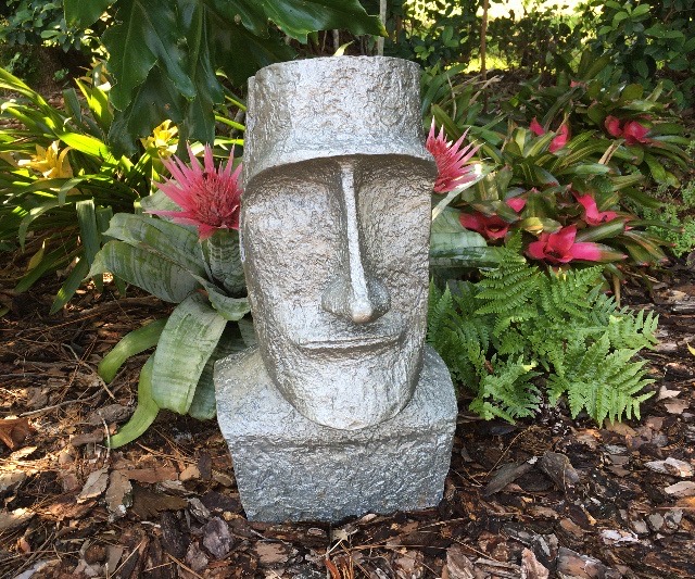 Solve Moai Head in the Garden jigsaw puzzle online with 80 pieces