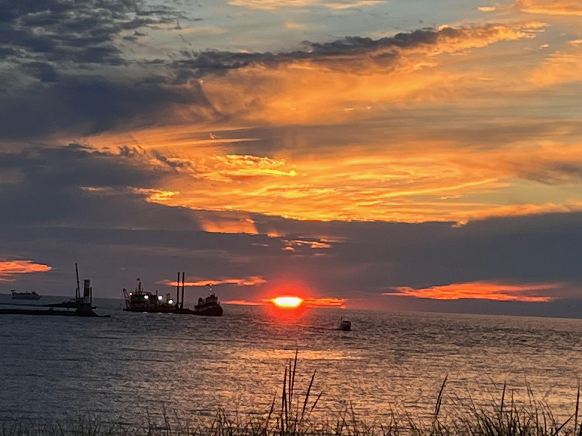 Solve Manistee Sunset by Debra Ely jigsaw puzzle online with 80 pieces