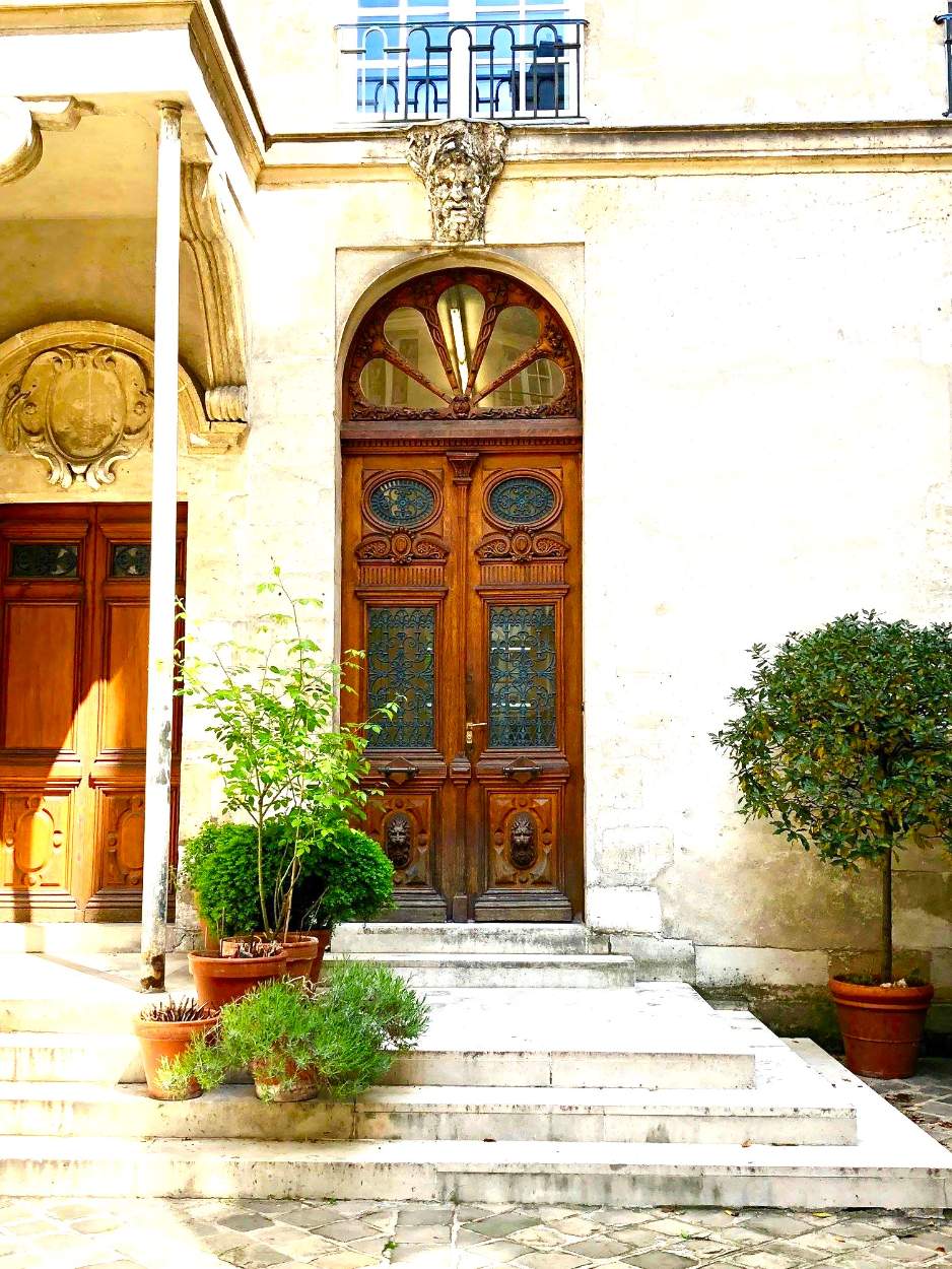 Solve Door seen in a courtyard off Rue des Francs Bourgeois in the 3rd ...