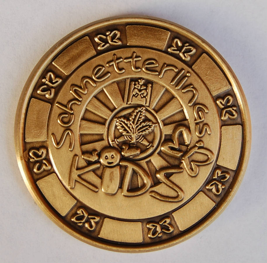 Solve Schmetterlingskids (Geocoin) jigsaw puzzle online with 81 pieces