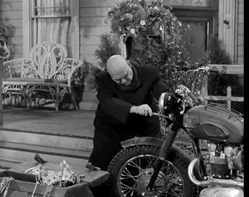 Solve uncle Fester jigsaw puzzle online with 99 pieces