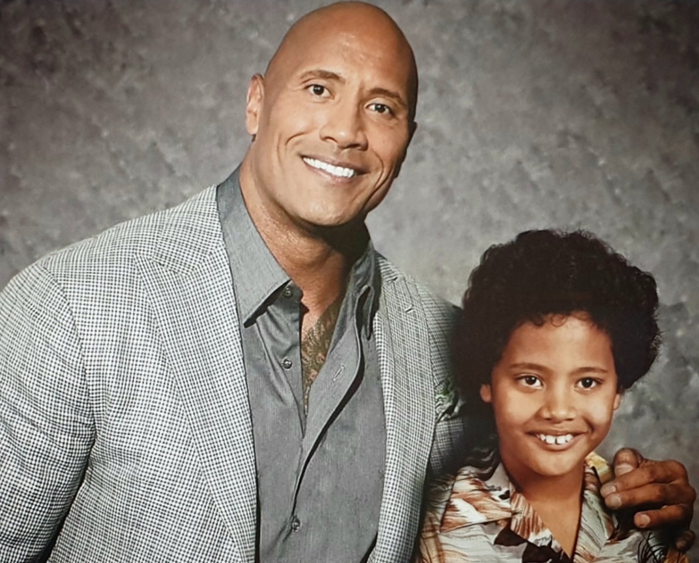 Solve DWAYNE JOHNSON, YOUNG AND OLDER jigsaw puzzle online with 30 pieces