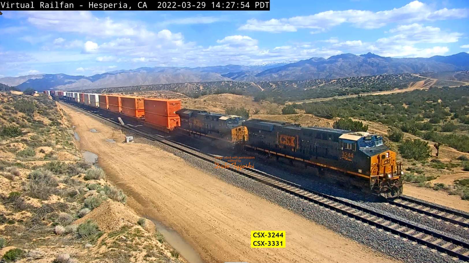 Solve Stunning desert and train CSX-3244 & CSX-3331 passing Hesperia 91-pc jigsaw puzzle online ...