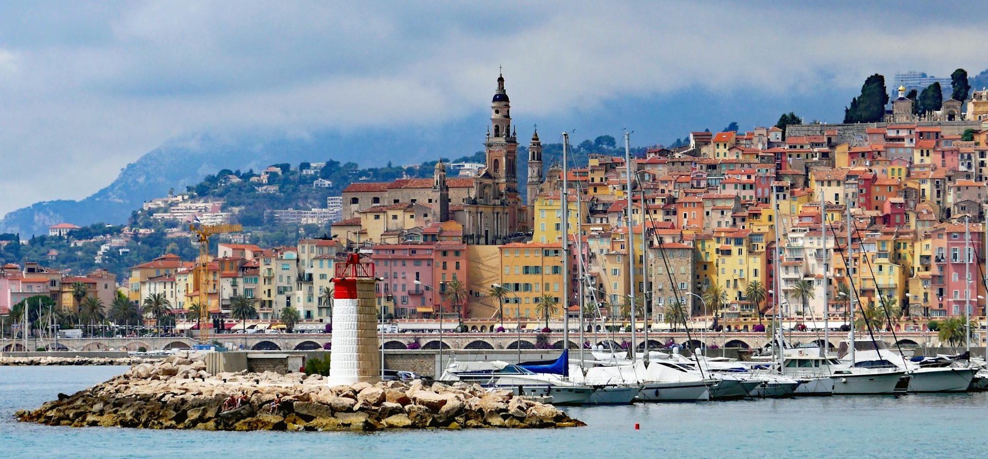 Solve The old harbour, Menton, France. jigsaw puzzle online with 105 pieces