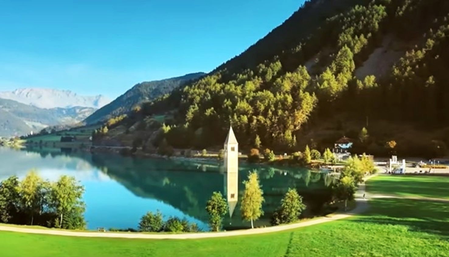 Solve Lake Resia, Italy jigsaw puzzle online with 180 pieces