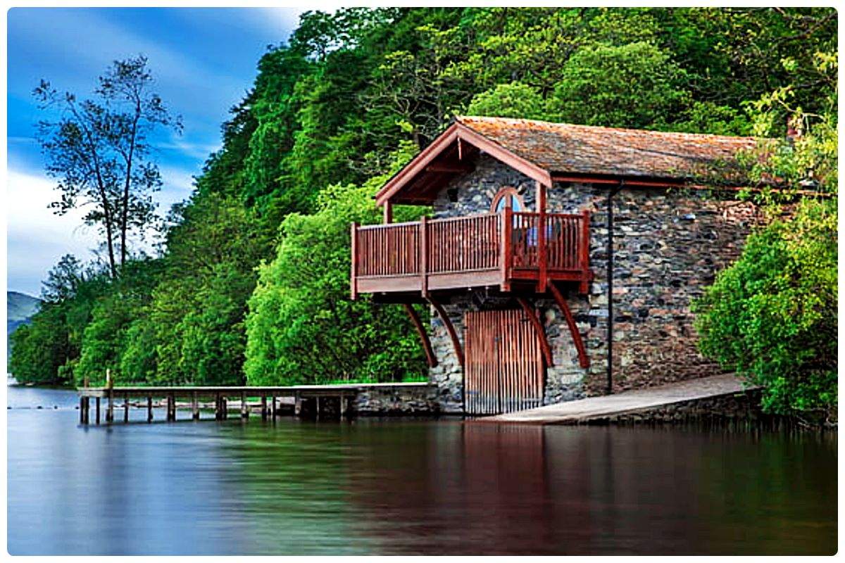 Solve Modern Cottage with Boat House on a Lake jigsaw puzzle online ...