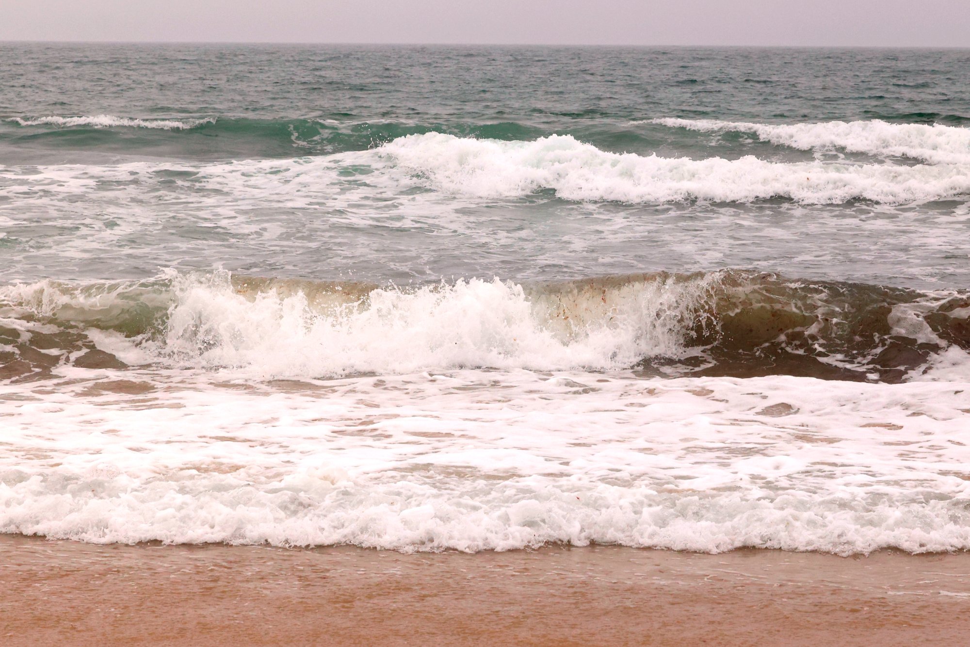 Solve Block Island surf, June 2025 jigsaw puzzle online with 126 pieces