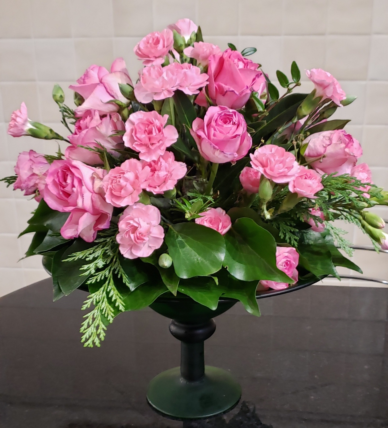 Solve Floral Display jigsaw puzzle online with 56 pieces