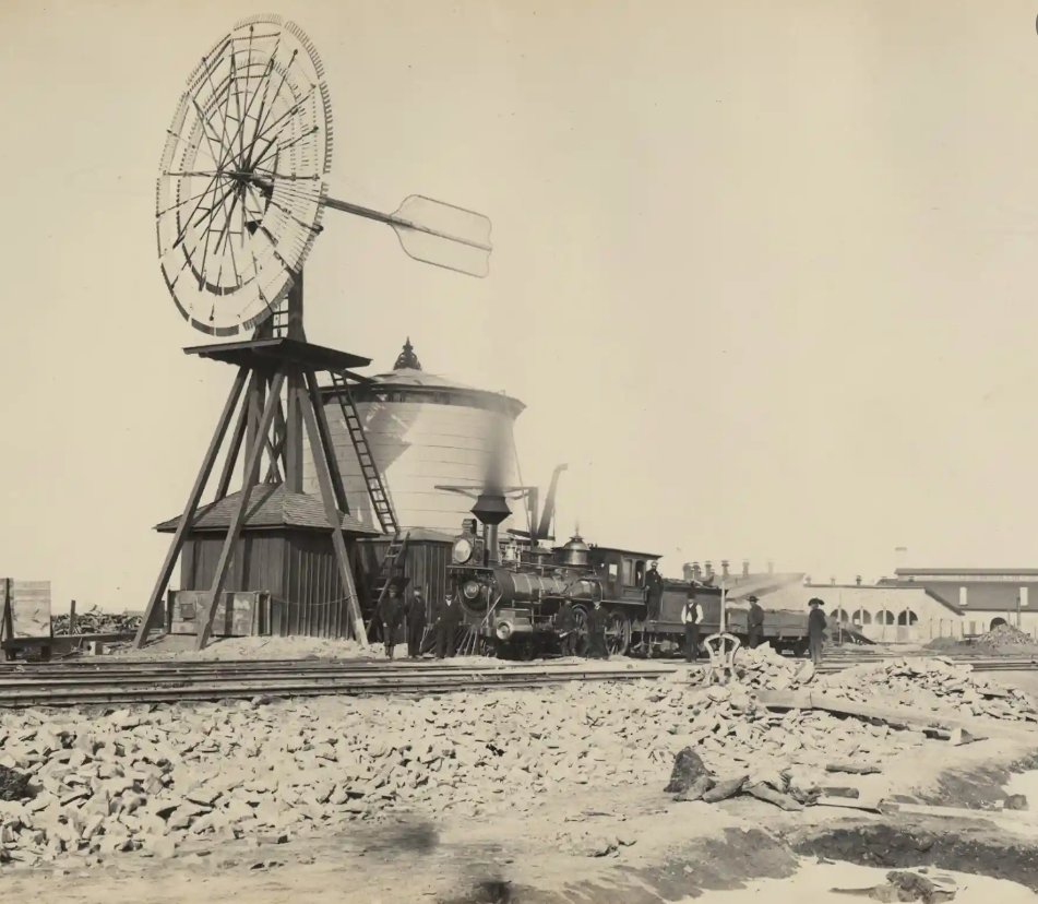 Solve Windmill and a Train jigsaw puzzle online with 56 pieces