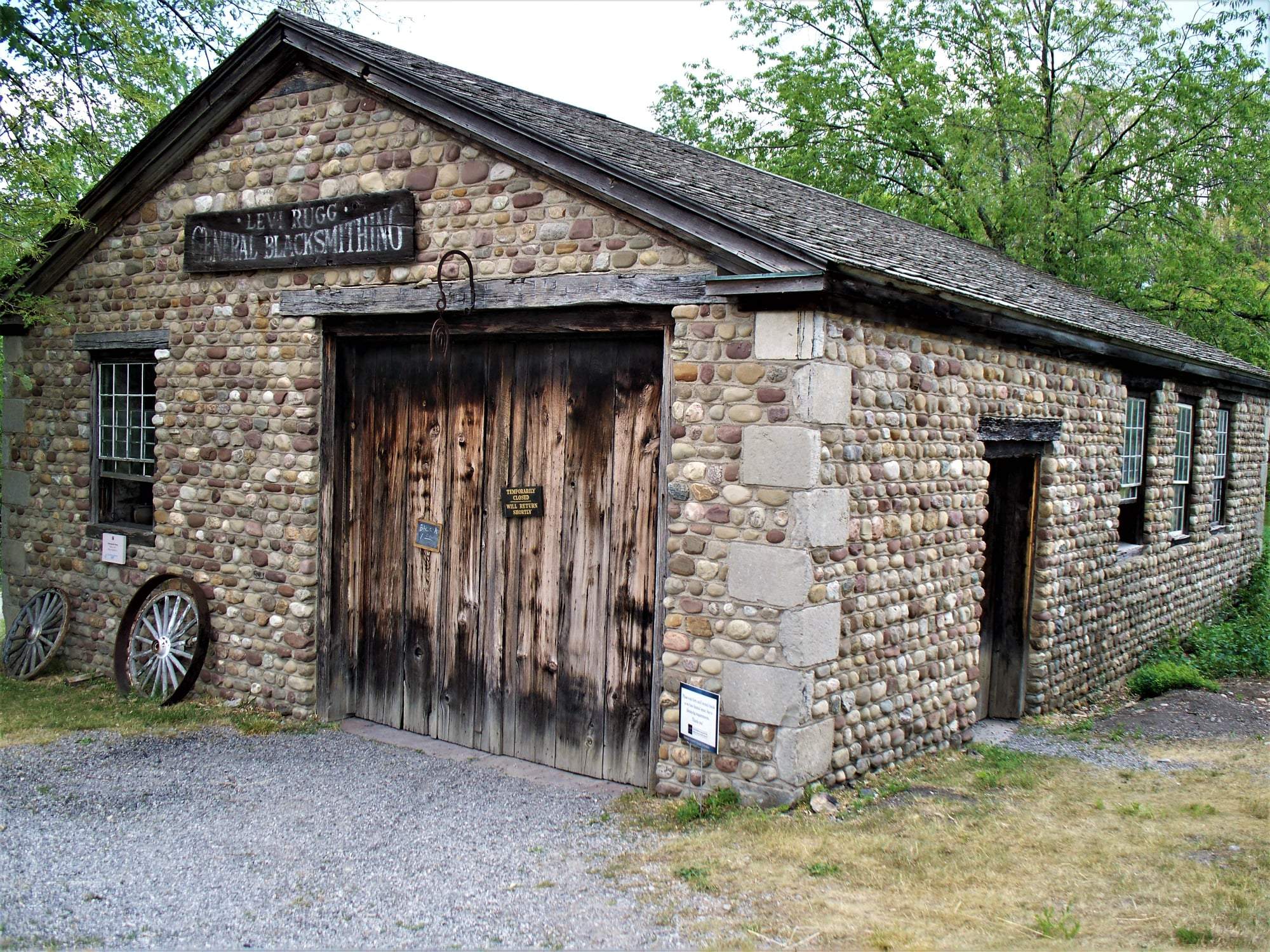 Solve Blacksmith Shop Mumford Museum jigsaw puzzle online with 300 pieces
