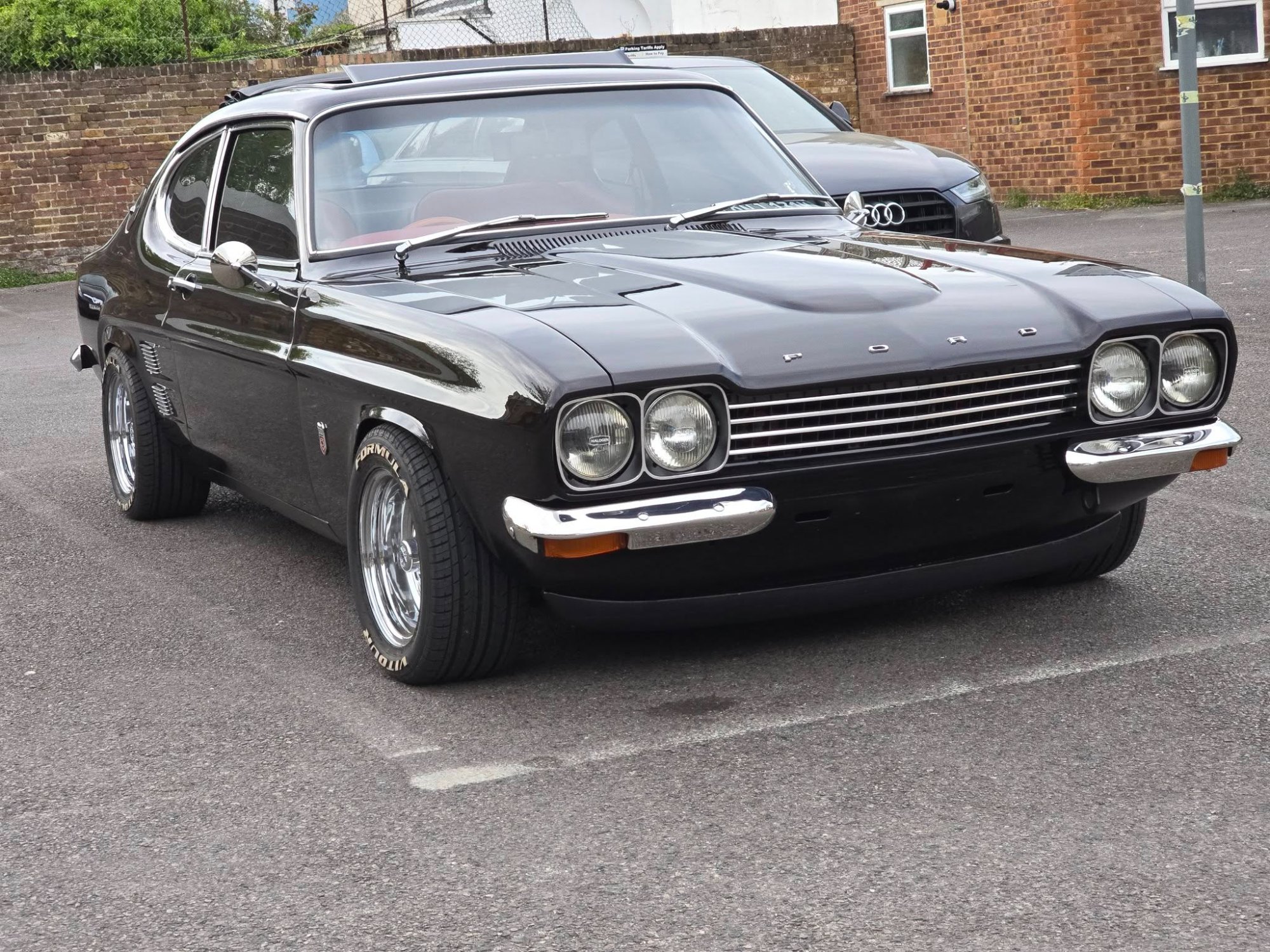 Solve 1973 - FORD Capri mk1 3.1GXL jigsaw puzzle online with 192 pieces