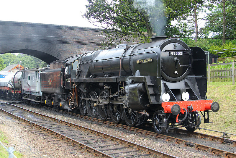 Solve BR Standard Class 9F 92203 departs Weybourne with a goods train ...