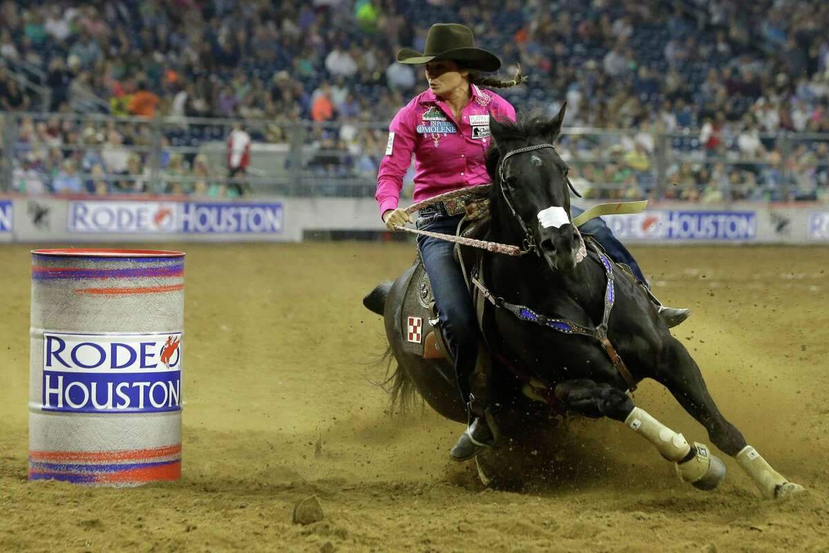 Solve Barrel Racing at Houston Rodeo jigsaw puzzle online with 280 pieces