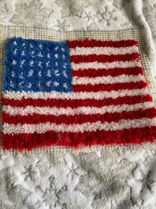 Solve Flag rug jigsaw puzzle online with 20 pieces