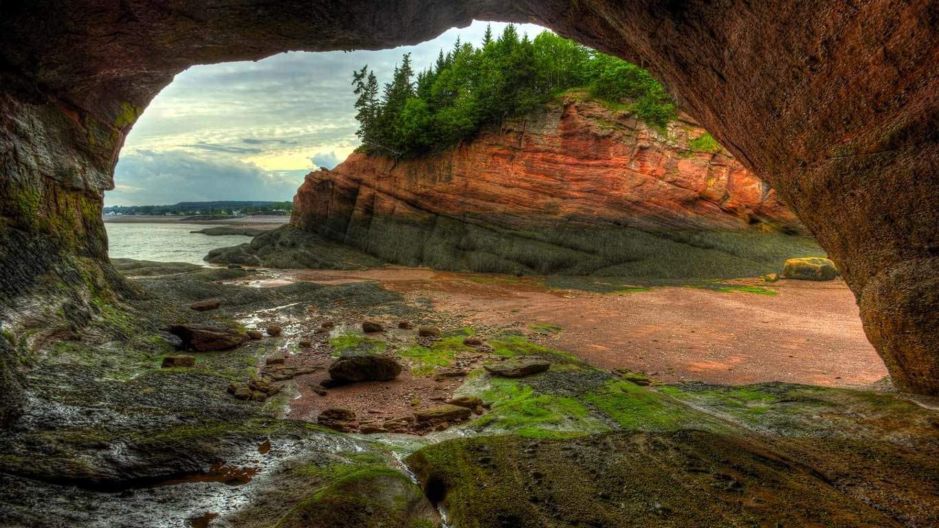 Solve 1 ~ Cave arch giving a peek outside. jigsaw puzzle online with 40 ...