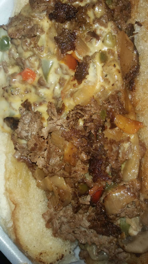 Solve Philly cheesesteak jigsaw puzzle online with 18 pieces