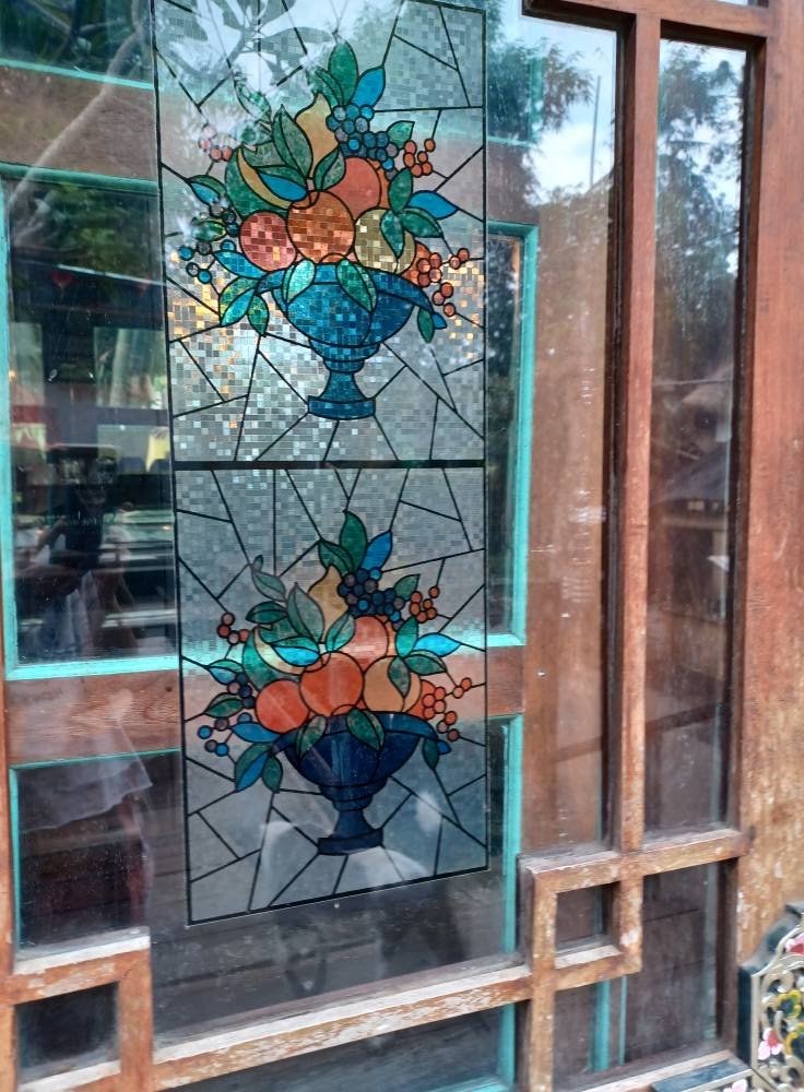 Solve Repurposed stained-glass windows. Coffee shop near my house ...